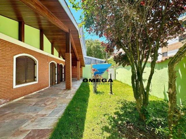 Casa com 4 dormitórios à venda, 140 m² por R$ 1.400.000,00 Tombo Guarujá/SP