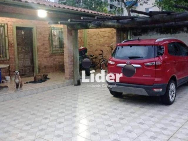 Casa com 4 dormitórios à venda, 161 m² por R$ 890.000,00 Martim de Sá Caraguatatuba/SP