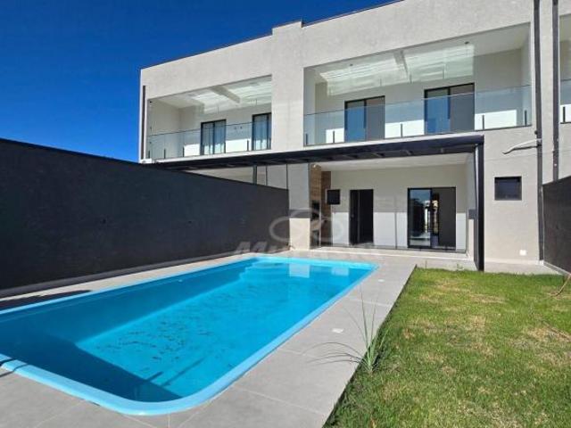 Casa com 4 dormitórios à venda, 171 m² por R$ 880.000,00 Brejatuba Guaratuba/PR