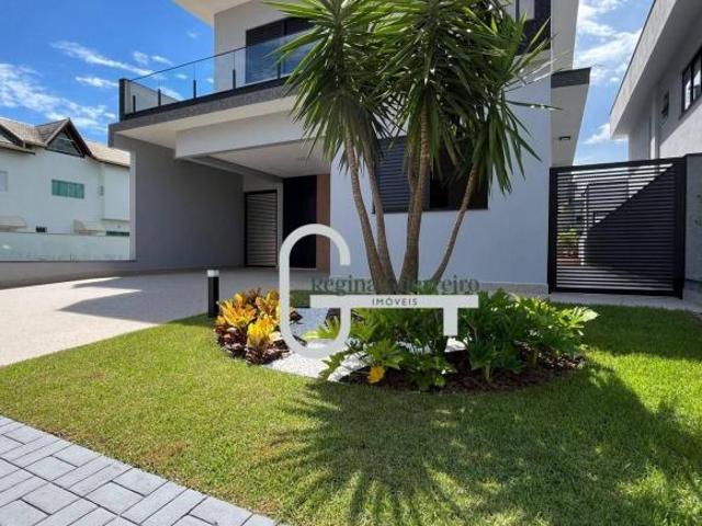 Casa com 4 dormitórios à venda, 180 m² por R$ 1.700.000,00 Residencial Três Marias Peruíbe/SP