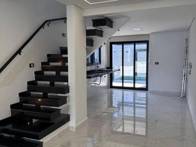 Casa com 4 dormitórios à venda, 204 m² por R$ 1.850.000,00 Boqueirão Praia Grande/SP