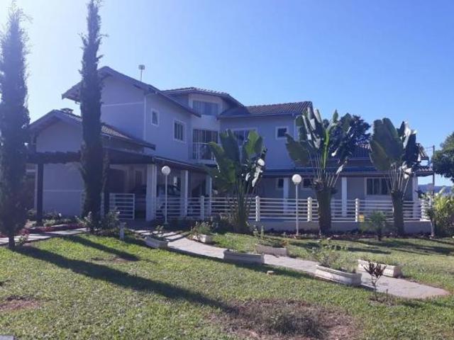 Casa com 4 dormitórios à venda, 214 m² por R$ 1.500.000,00 Condomínio Ninho Verde II Pardinho/SP