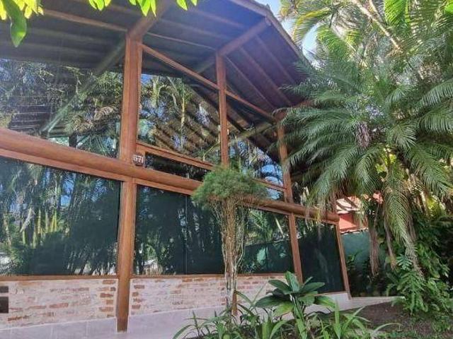 Casa com 4 dormitórios à venda, 215 m² por R$ 4.500.000,00 Riviera Módulo 30 Bertioga/SP