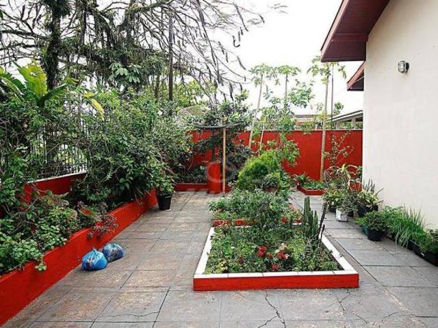 Casa com 4 dormitórios à venda, 210 m² por R$ 540.000,00 Cohapar Guaratuba/PR