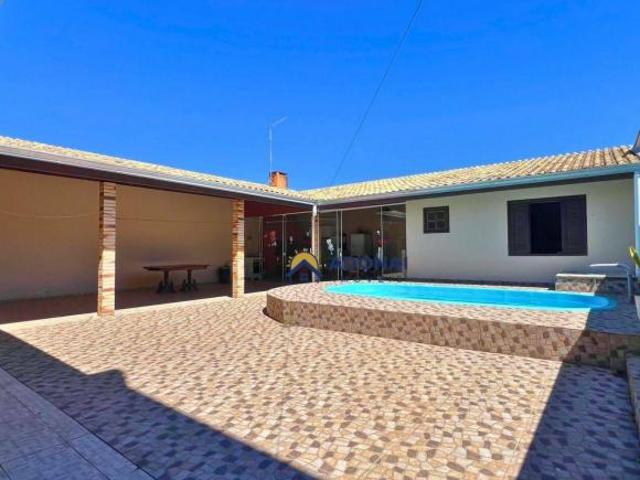 Casa com 4 dormitórios à venda, 210 m² por R$ 820.000,00 Coroados Guaratuba/PR