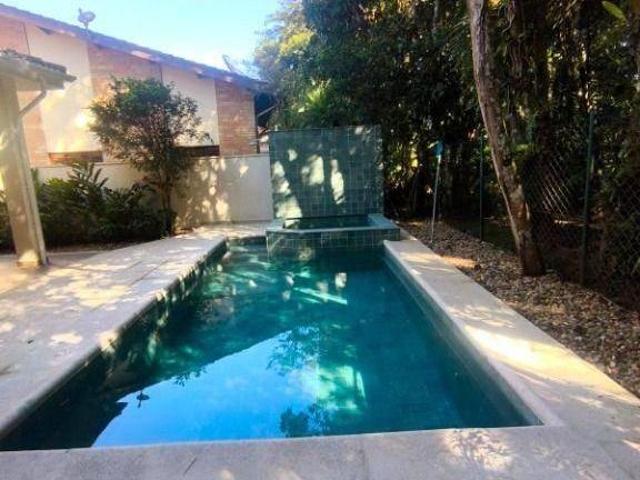 Casa com 4 dormitórios à venda, 226 m² por R$ 4.000.000,00 Riviera Módulo 18 Bertioga/SP