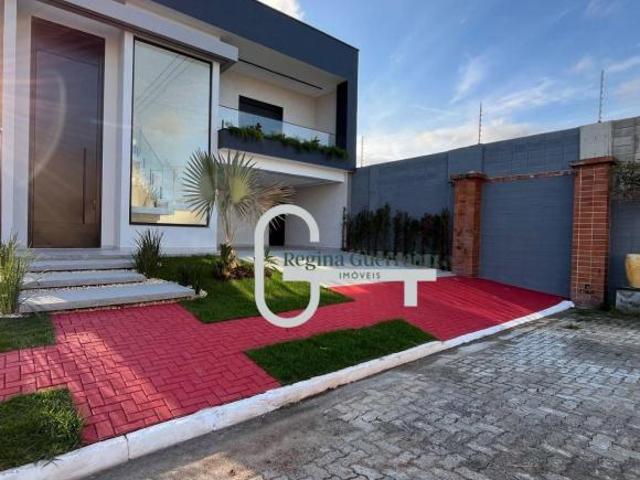 Casa com 4 dormitórios à venda, 227 m² por R$ 1.950.000,00 Condomínio Flora Rica Peruíbe/SP
