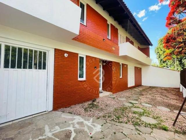 Casa com 4 dormitórios à venda, 220 m² por R$ 690.000,00 Jardim América São Leopoldo/RS