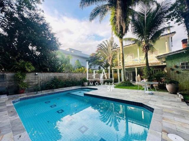 Casa com 4 dormitórios à venda, 221 m² por R$ 2.700.000,00 Riviera de São Lourenço Bertioga/SP