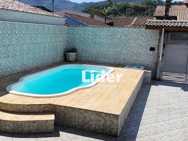 Casa com 4 dormitórios à venda, 237 m² por R$ 850.000,00 Caputera Caraguatatuba/SP