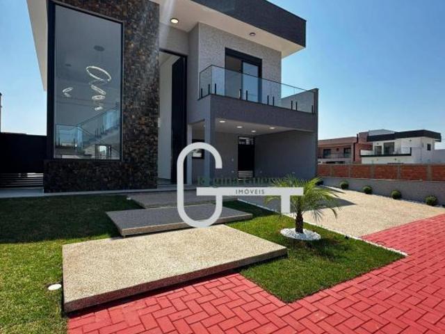 Casa com 4 dormitórios à venda, 239 m² por R$ 1.950.000,00 Condomínio Flora Rica Peruíbe/SP