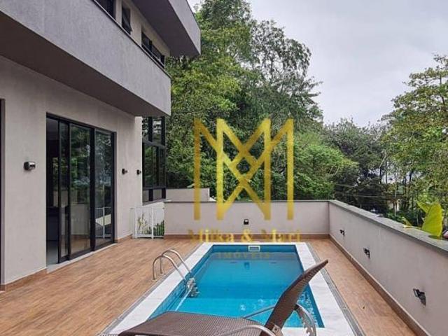 Casa com 4 dormitórios à venda, 230 m² por R$ 2.500.000