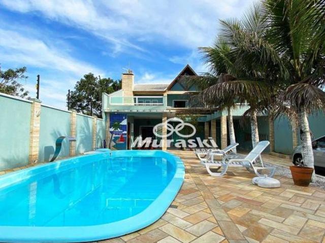 Casa com 4 dormitórios à venda, 230 m² por R$ 850.000,00 Coroados Guaratuba/PR