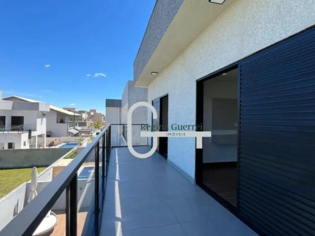 Casa com 4 dormitórios à venda, 246 m² por R$ 1.700.000,00 Condomínio Flora Rica Peruíbe/SP