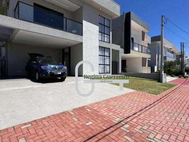 Casa com 4 dormitórios à venda, 246 m² por R$ 1.700.000,00 Condomínio Flora Rica Peruíbe/SP