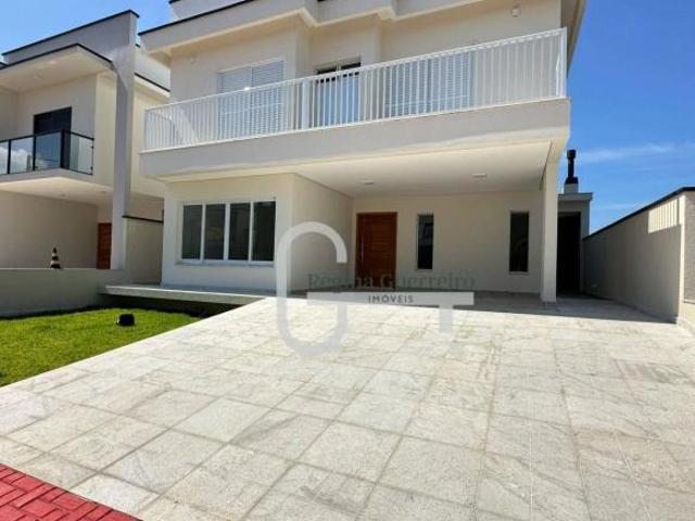Casa com 4 dormitórios à venda, 255 m² por R$ 1.765.000,00 Condomínio Flora Rica Peruíbe/SP