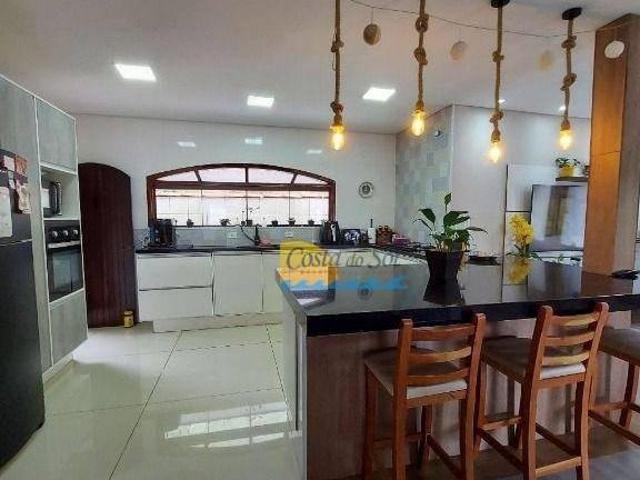 Casa com 4 dormitórios à venda, 259 m² por R$ 1.380.000,00 Balneário Flórida Praia Grande/SP