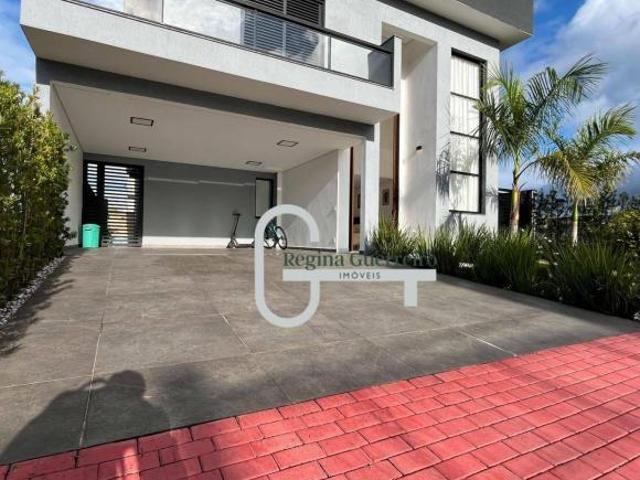Casa com 4 dormitórios à venda, 265 m² por R$ 2.450.000,00 Condomínio Flora Rica Peruíbe/SP