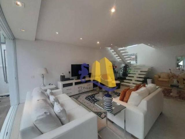 Casa com 4 dormitórios à venda, 269 m² por R$ 6.050.000 Riviera Módulo 22 Bertioga/SP