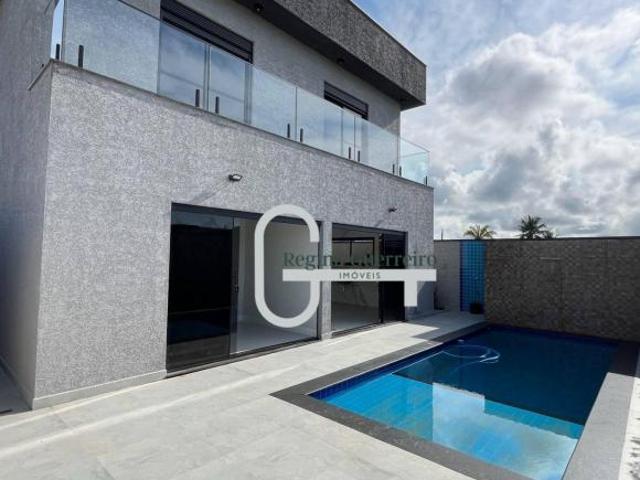 Casa com 4 dormitórios à venda, 262 m² por R$ 2.000.000,00 Condomínio Flora Rica Peruíbe/SP