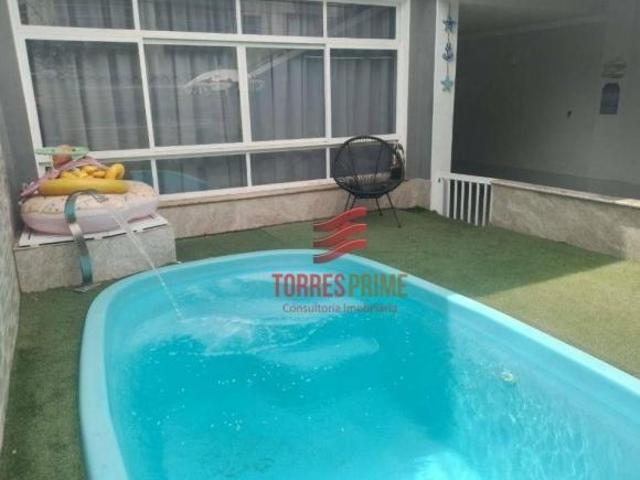 Casa com 4 dormitórios à venda, 294 m² por R$ 2.350.000,00 Ponta da Praia Santos/SP