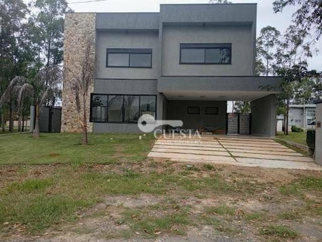 Casa com 4 dormitórios à venda, 296 m² por R$ 1.350.000,00 Condomínio Ninho Verde I Eco Residence