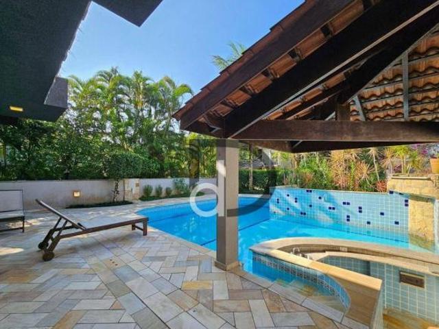 Casa com 4 dormitórios à venda, 296 m² por R$ 5.749.000,00 Riviera de São Lourenço Bertioga/SP