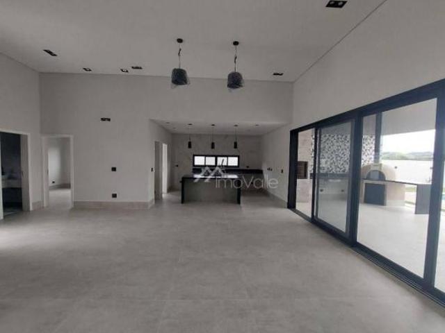 Casa com 4 dormitórios à venda, 290 m² por R$ 3.190.000,00 Condomínio Residencial Colinas do Parat