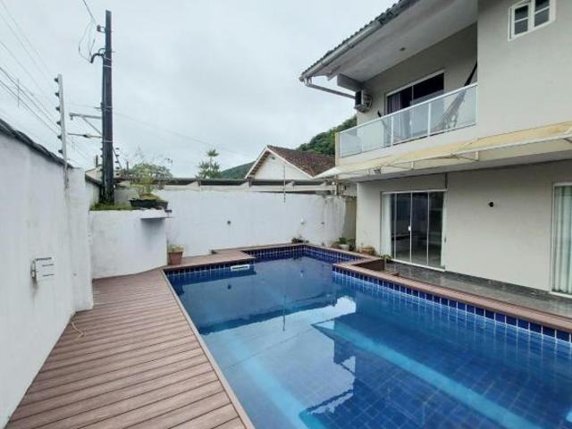 Casa com 4 dormitórios à venda, 290 m² por R$ 1.100.000,00 Guaiuba Guarujá/SP
