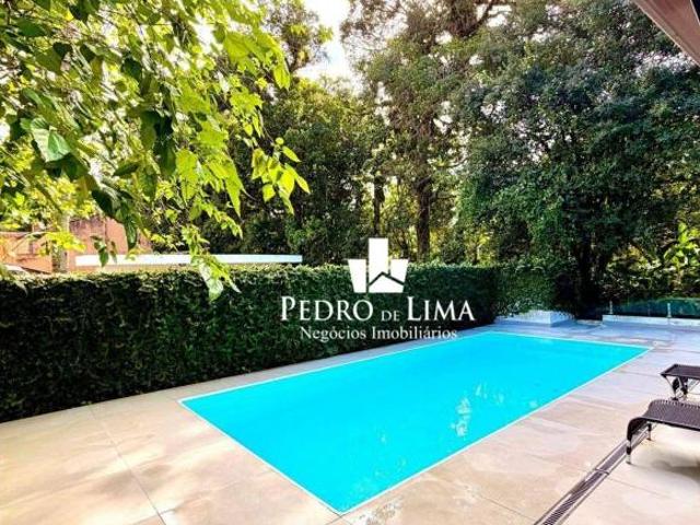 Casa com 4 dormitórios à venda, 300 m² por R$ 5.900.000,00 Riviera Módulo 4 Bertioga/SP