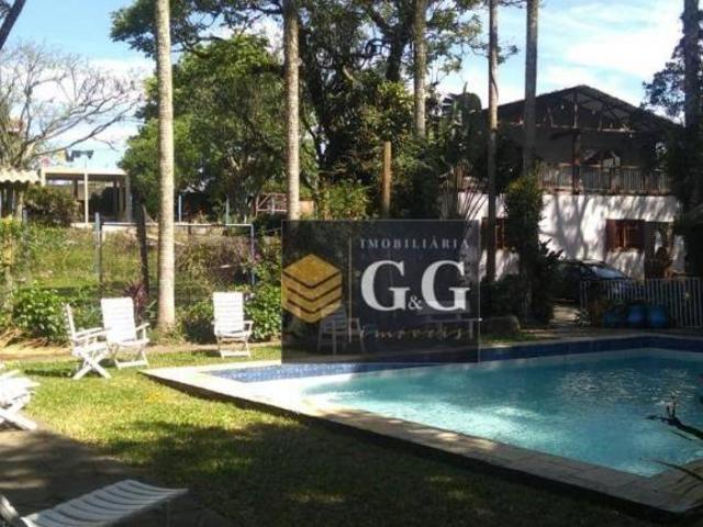 Casa com 4 dormitórios à venda, 303 m² por R$ 950.000,00 Jardim Krahe Viamão/RS