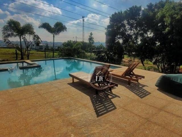 Casa com 4 dormitórios à venda, 334 m² por R$ 4.900.000,00 Condomínio Campos de Santo Antonio II