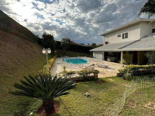 Casa com 4 dormitórios à venda, 330 m² por R$ 1.850.000,00 Condomínio Jardim das Palmeiras Braga