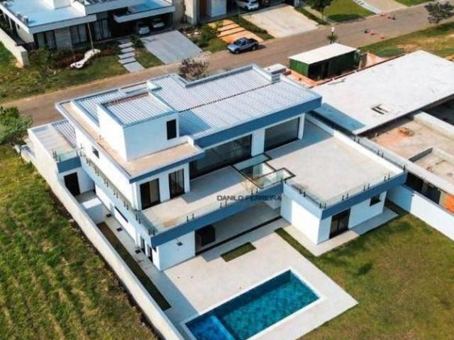 Casa com 4 dormitórios à venda, 331 m² por R$ 3.700.000,00 Residencial Parque Campos de Santo Antô