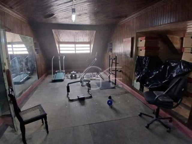 Casa com 4 dormitórios à venda, 347 m² por R$ 1.100.000,00 Encruzilhada Santos/SP