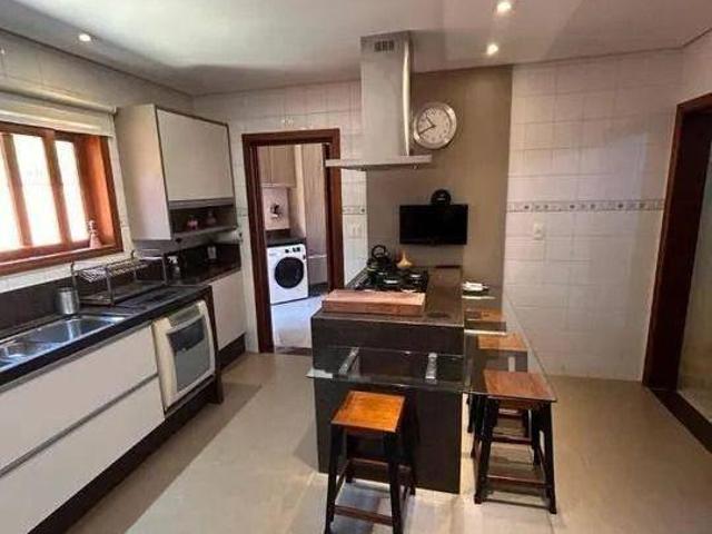 Casa com 4 dormitórios à venda, 370 m² por R$ 1.700.000 Condomínio Residencial Terras do Caribe