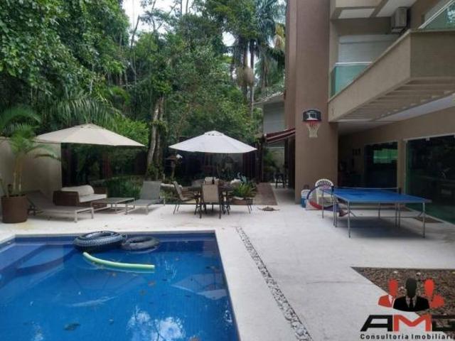 Casa com 4 dormitórios à venda, 371 m² por R$ 6.000.000,00 Riviera Módulo 21 Bertioga/SP