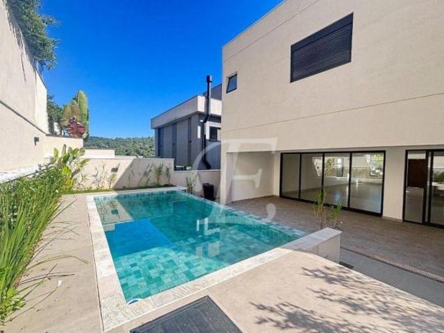 Casa com 4 dormitórios à venda, 386 m² por R$ 4.340.000,00 Colinas da Anhangüera Santana de Parn