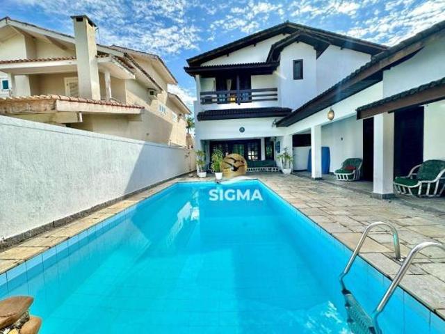 Casa com 4 dormitórios à venda, 380 m² por R$ 2.500.000,00 Jardim Acapulco Guarujá/SP