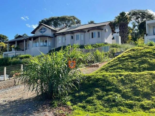 Casa com 4 dormitórios à venda, 390 m² por R$ 2.560.000,00 Condomínio Jardim das Palmeiras Braga