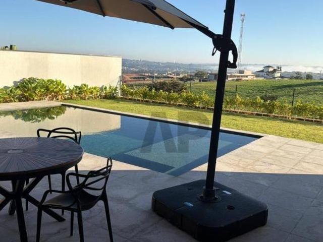 Casa com 4 dormitórios à venda, 405 m² por R$ 5.350.000,00 Condomínio Campos de Santo Antônio 2
