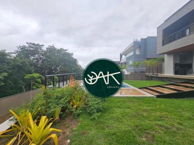Casa com 4 dormitórios à venda, 400 m² por R$ 4.500.000,00 Condomínio Reserva do Paratehy São Jo