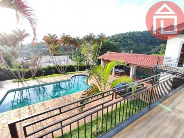 Casa com 4 dormitórios à venda, 413 m² por R$ 1.500.000,00 Condomínio Jardim das Palmeiras Braga