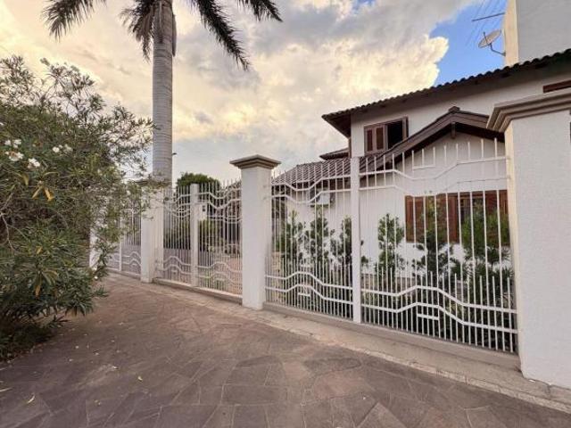 Casa com 4 dormitórios à venda, 427 m²