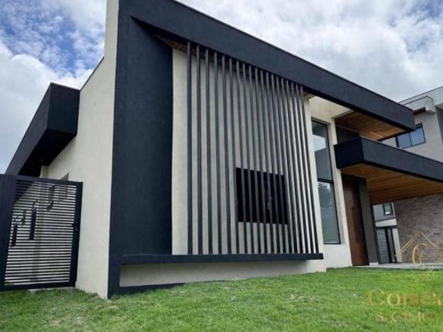 Casa com 4 dormitórios à venda, 420 m² por R$ 2.860.000,00 Condomínio Residencial Colinas do Parat