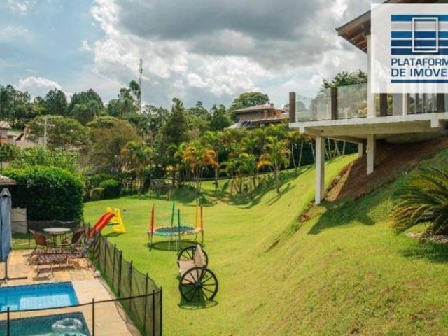 Casa com 4 dormitórios à venda, 420 m² por R$ 4.750.000,00 Condomínio Residencial Vila Rica Brag