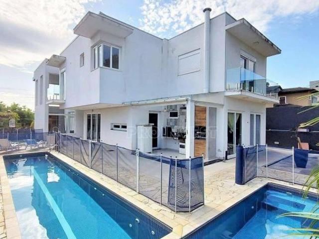 Casa com 4 dormitórios à venda, 438 m² Golf Village