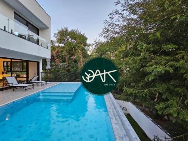 Casa com 4 dormitórios à venda, 439 m² por R$ 4.800.000,00 Condomínio Reserva do Paratehy São Jo