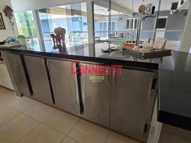 Casa com 4 dormitórios à venda, 430 m² por R$ 1.700.000,00 Village Bandeirantes Ribeirão Preto/S