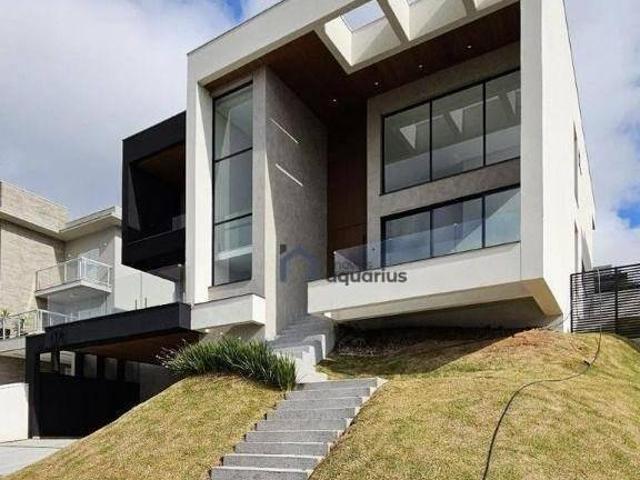 Casa com 4 dormitórios à venda, 440 m² por R$ 5.000.000,00 Condomínio Reserva do Paratehy São Jo